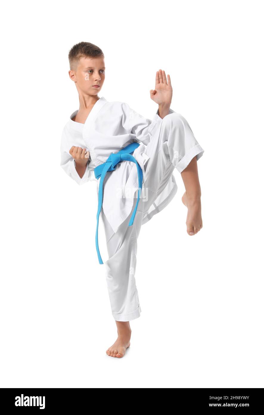 Little boy practicing karate on white background Stock Photo - Alamy