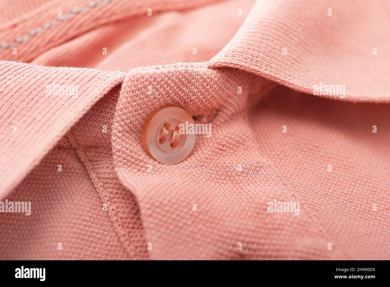 Closeup view of button on shirt Stock Photo - Alamy