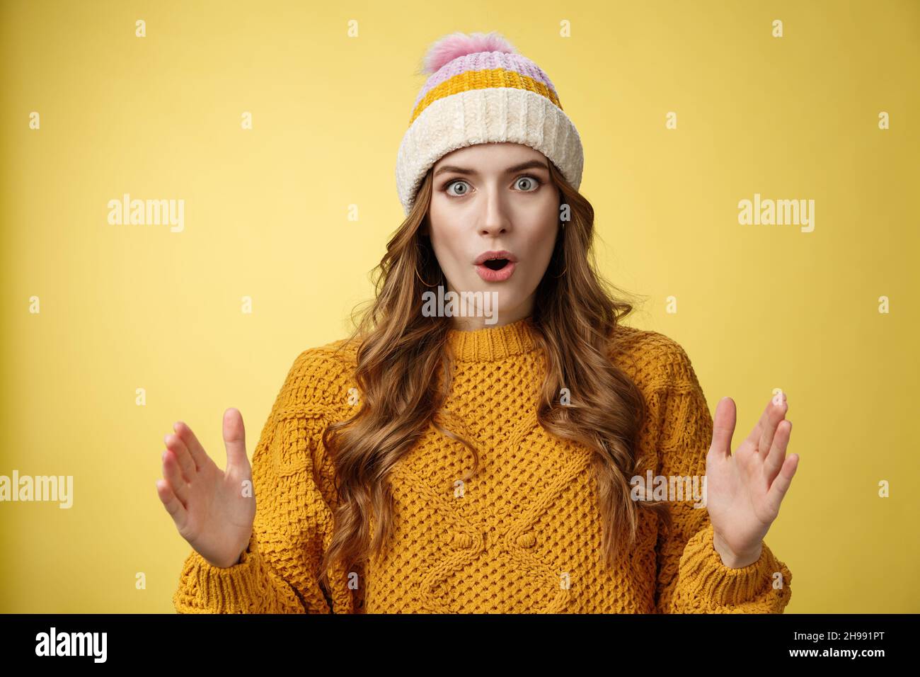 Impressed good-looking caucasian woman describing shaping large very ...