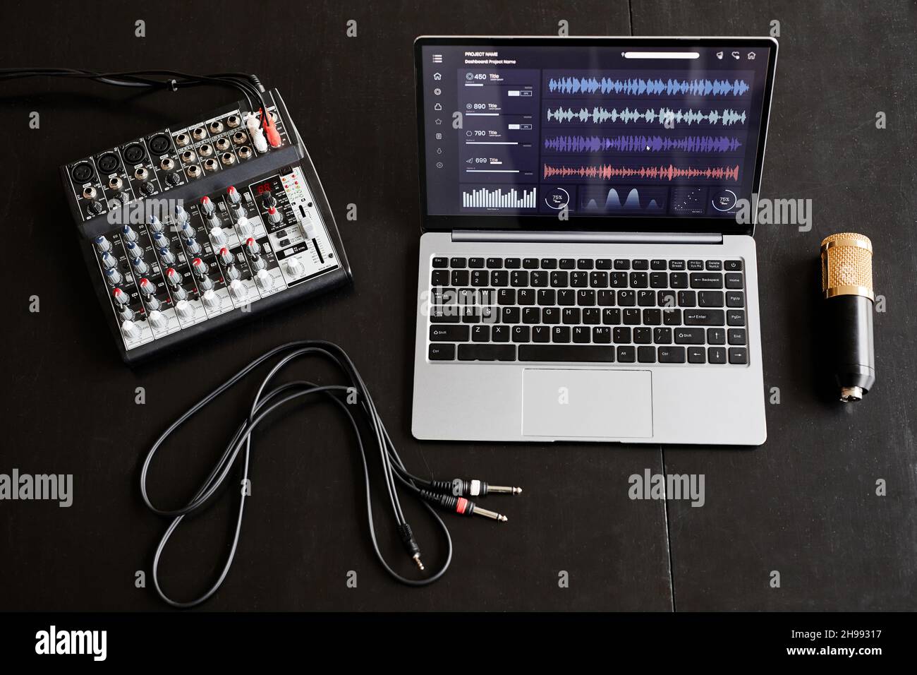 Top view background image of recording equipment and laptop with audio ...