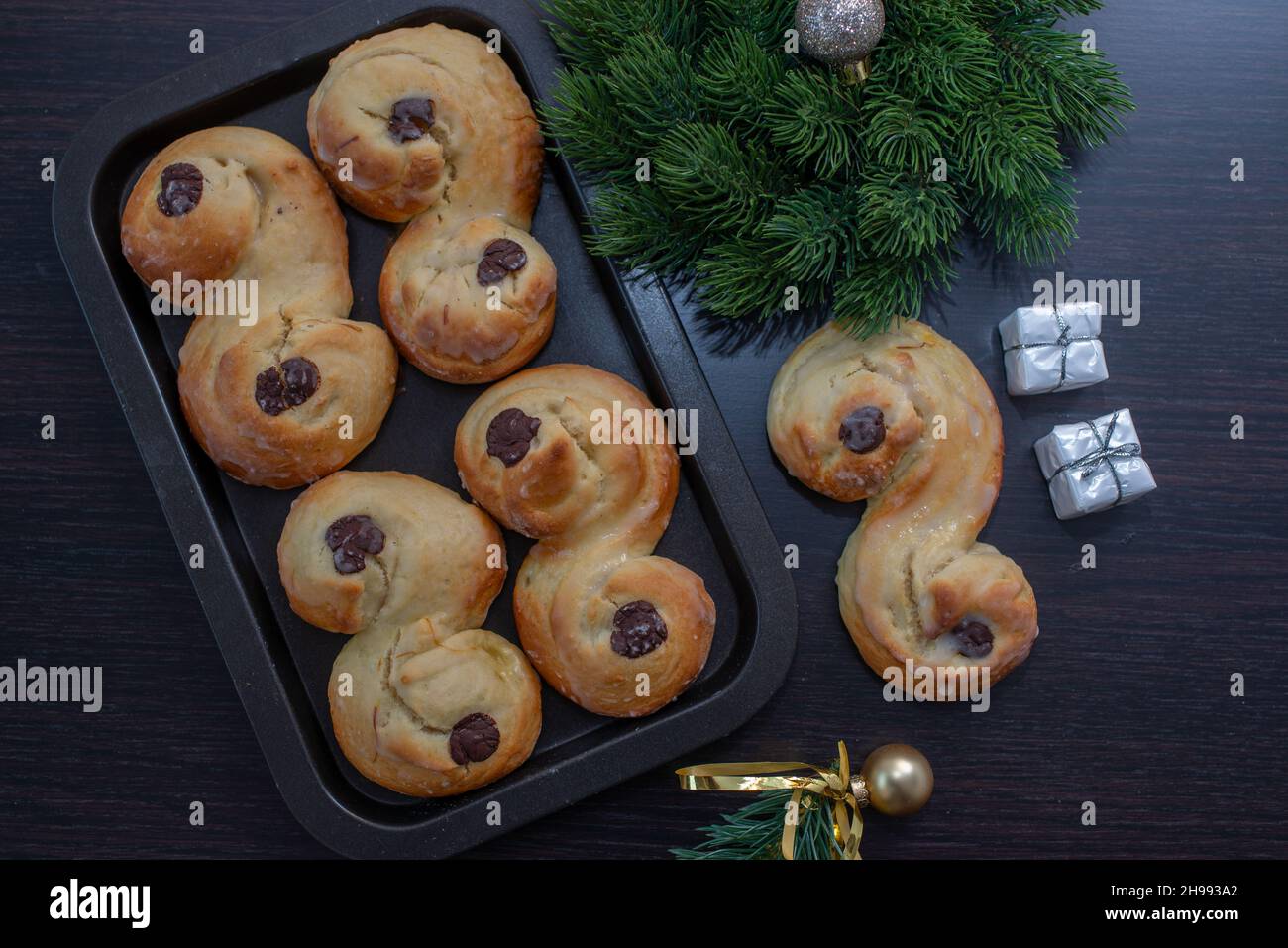 Swedish and scandinavian saffron buns Lussekatter on a table Stock ...