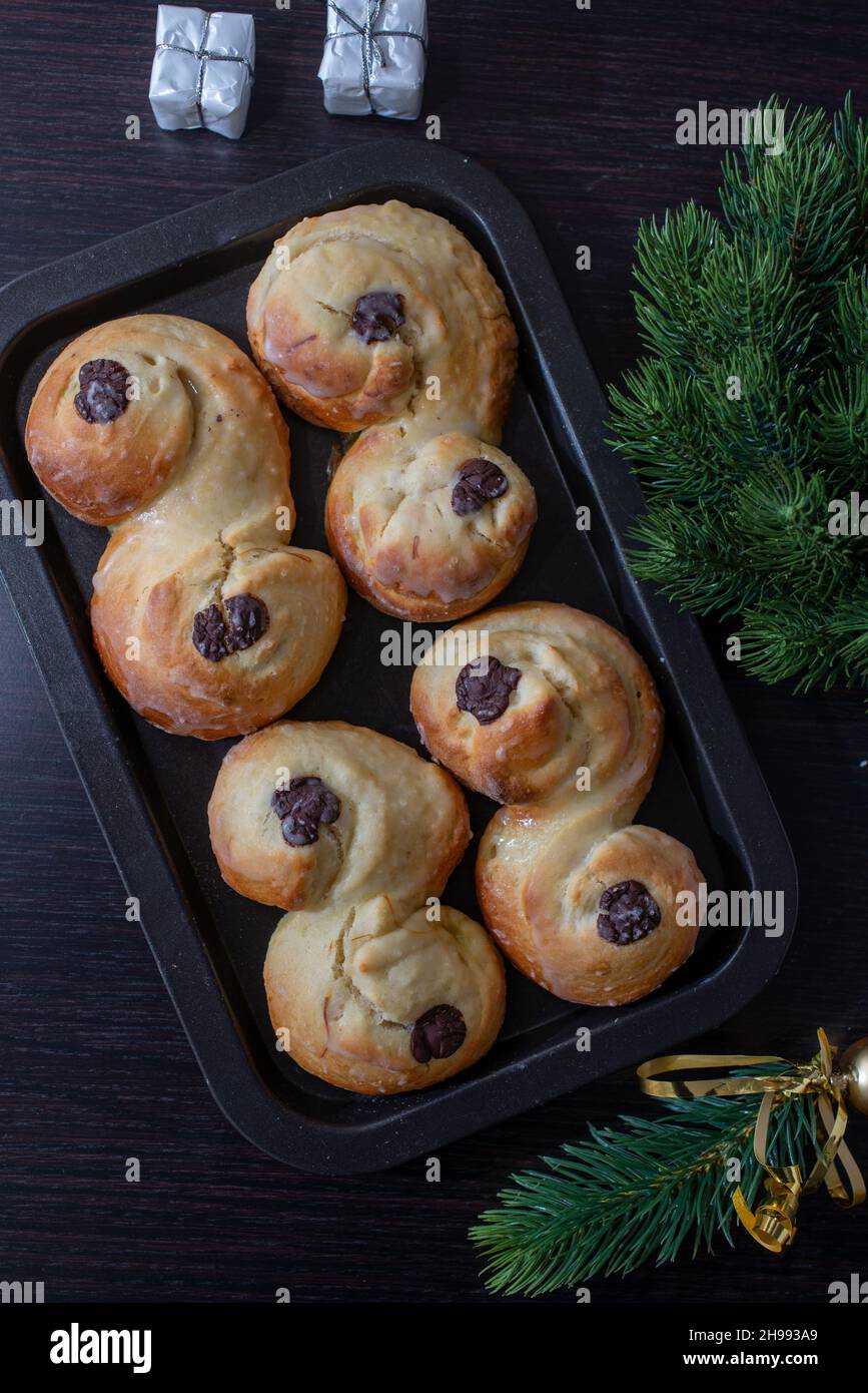 Swedish and scandinavian saffron buns Lussekatter on a table Stock ...