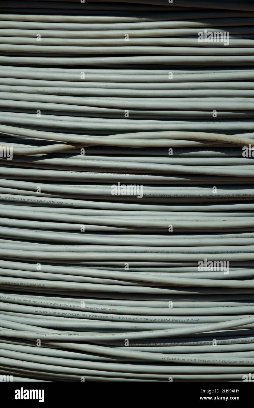 A roll of electrical cable. Stacked up cable Stock Photo - Alamy