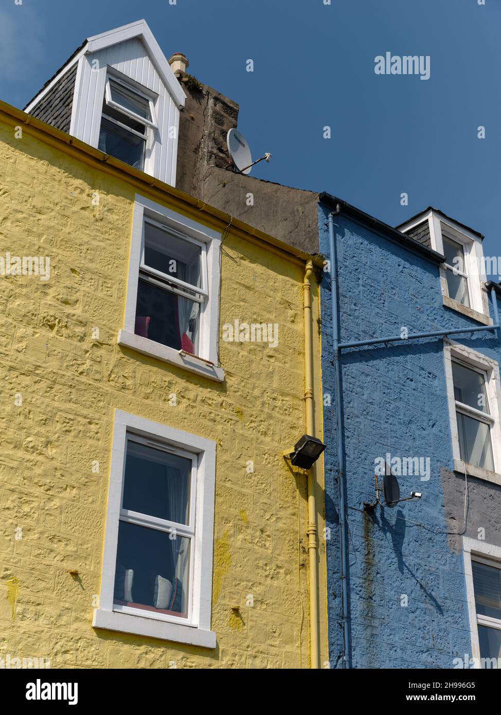 Details of the yellow & blue painted waterfront buildings of Tobermory ...