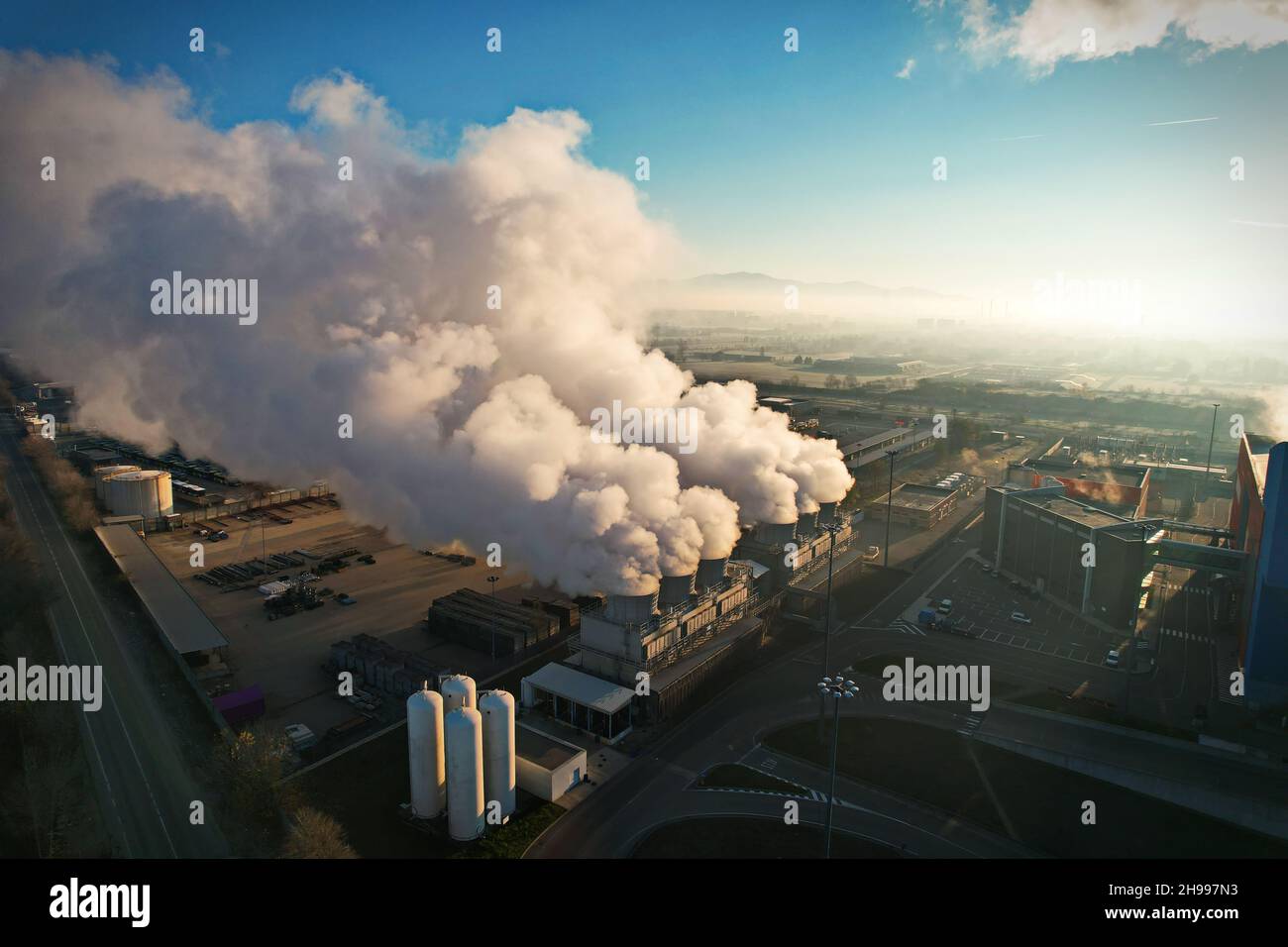Factory chimneys with smoke emission. Industrial factory pollution ...