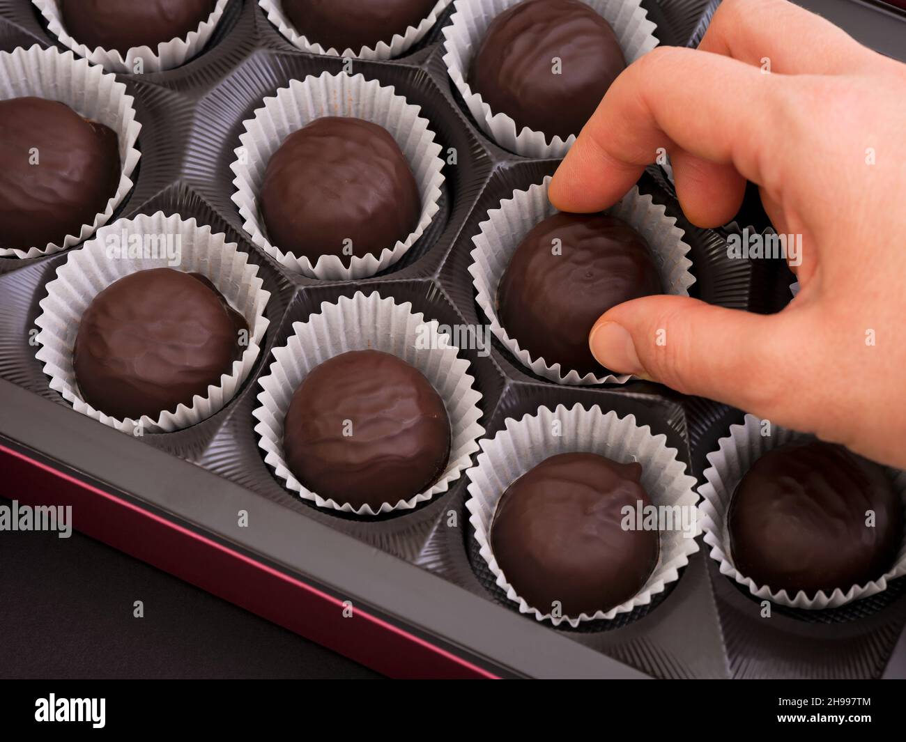 Taking chocolate hi-res stock photography and images - Alamy