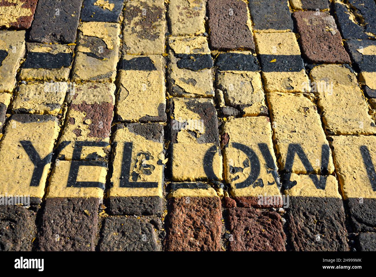 A yellow line on the platform at the train station in Lamy, New Mexico ...