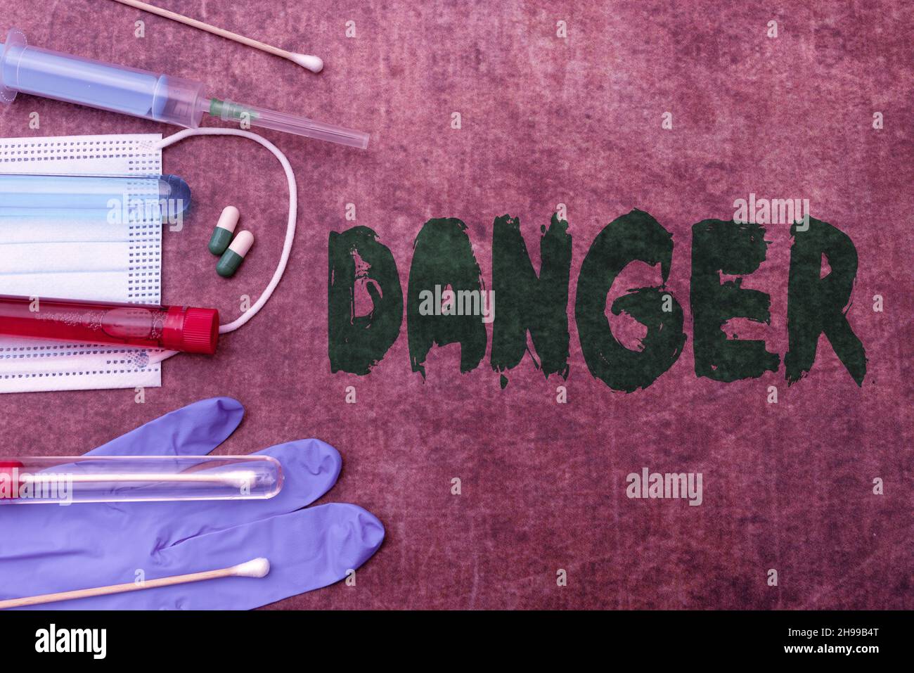 Writing displaying text Danger. Concept meaning the possibility of ...