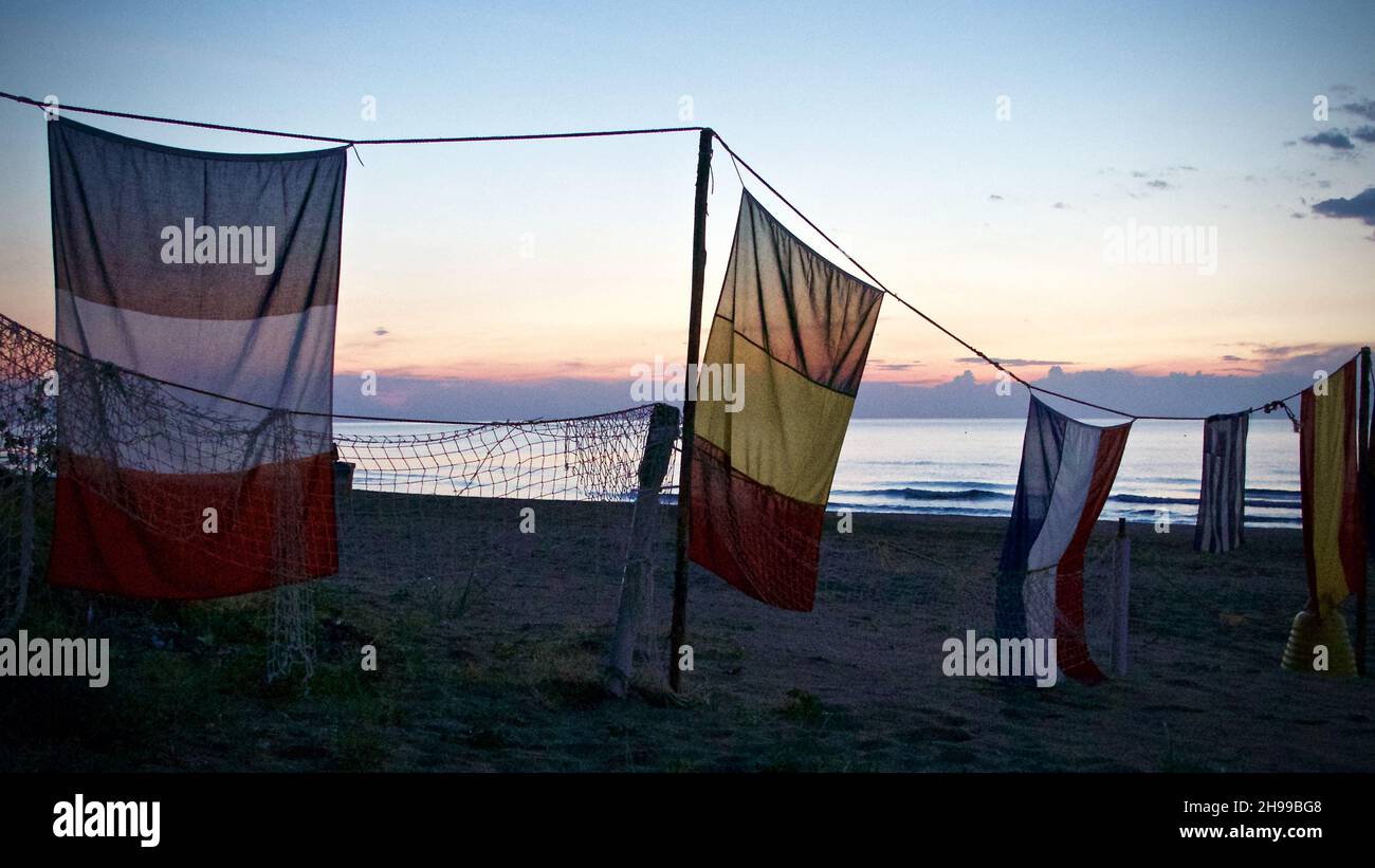 A closeup shot of the flags of different countries on the beach Stock ...