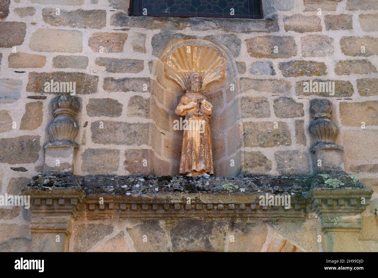 Old religious statue in French wall Stock Photo - Alamy