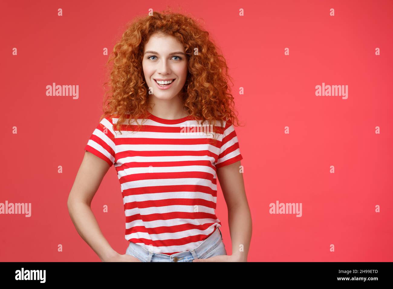 Sassy Confident Cheeky Good Looking Redhead Curly Haired Woman Hold