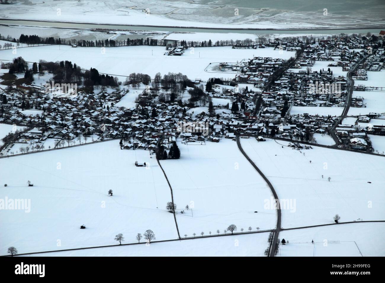 An aerial view of a snow-covered village in Fussen, Alps, Germany Stock ...