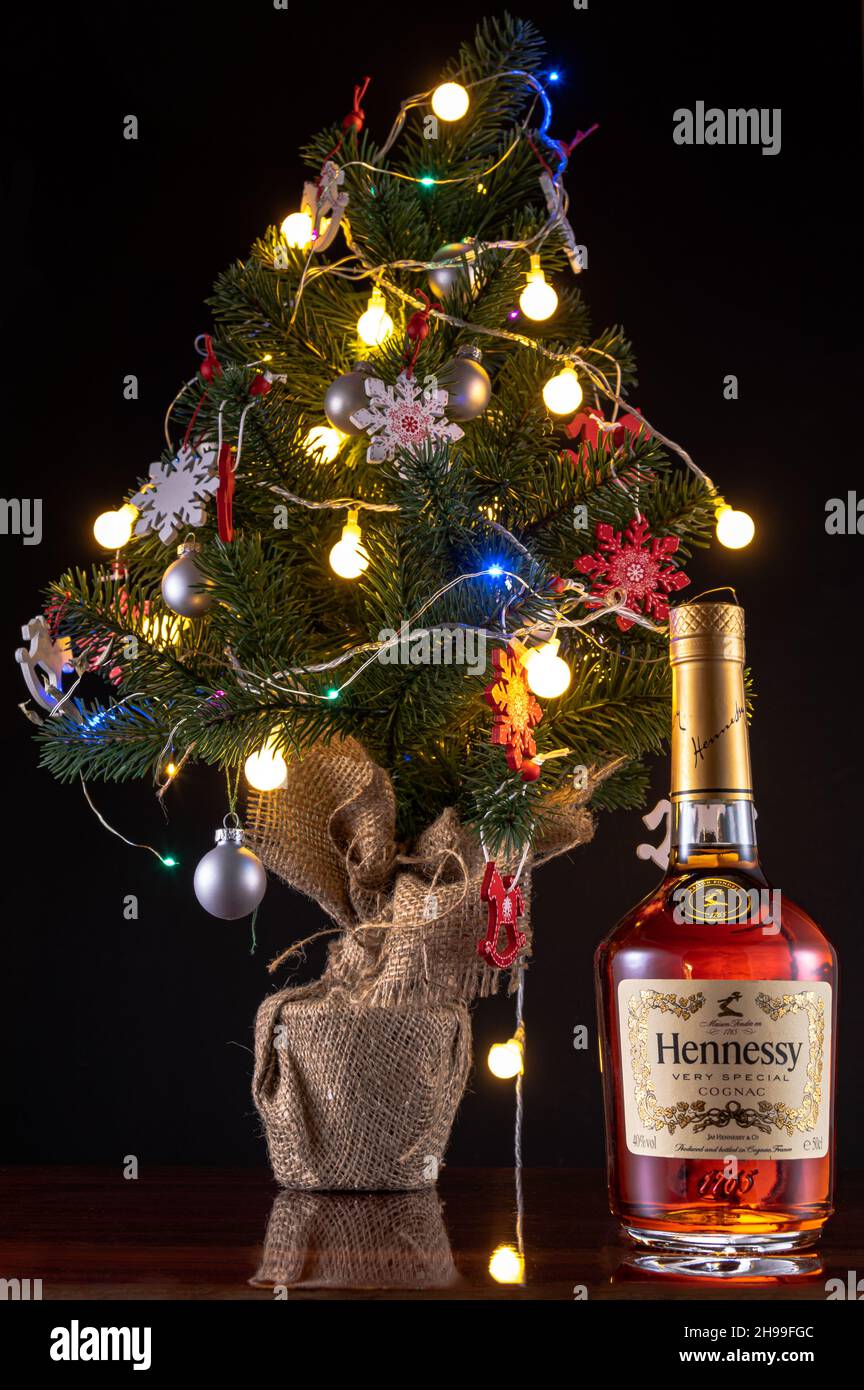 Kyiv, UKR - DEC 20, 2020: Hennessy cognac bottle and Christmas tree ...