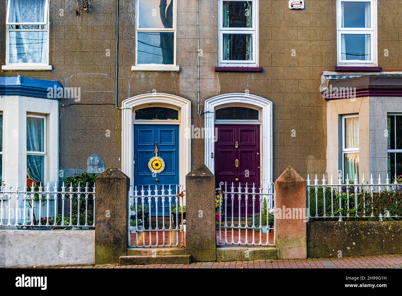 Traditional Irish blue and violet neighbouring doors in Georgian style ...