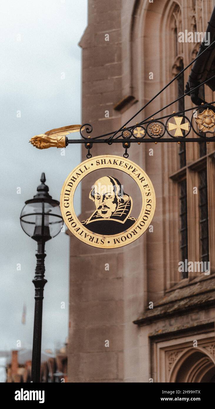 The Shakespeare's Schoolroom and Guildhall direction sign hanging ...