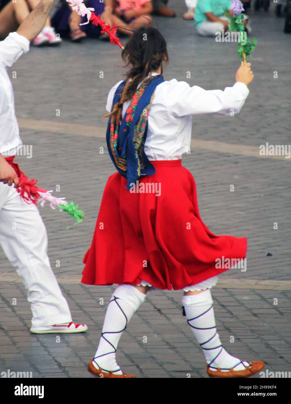 A female folk dancer with a national costume outside Stock Photo - Alamy