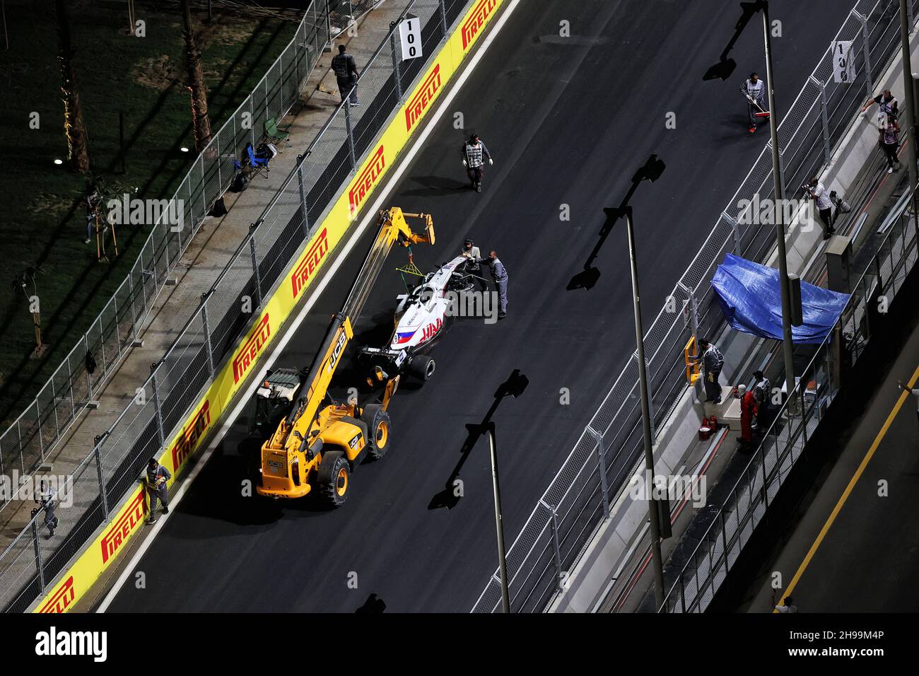 The Haas VF-21 of Nikita Mazepin (RUS) Haas F1 Team is craned away afte ...