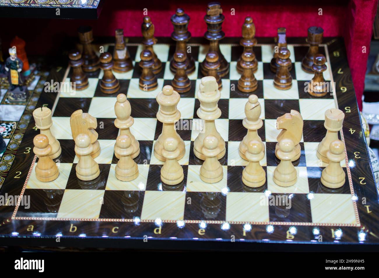Intellectual game -chess. Wooden chess pieces on the chessboard Stock ...