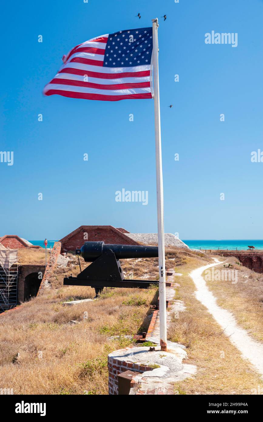 American flag and cannon on the parapet. Dry Tortugas National Park ...