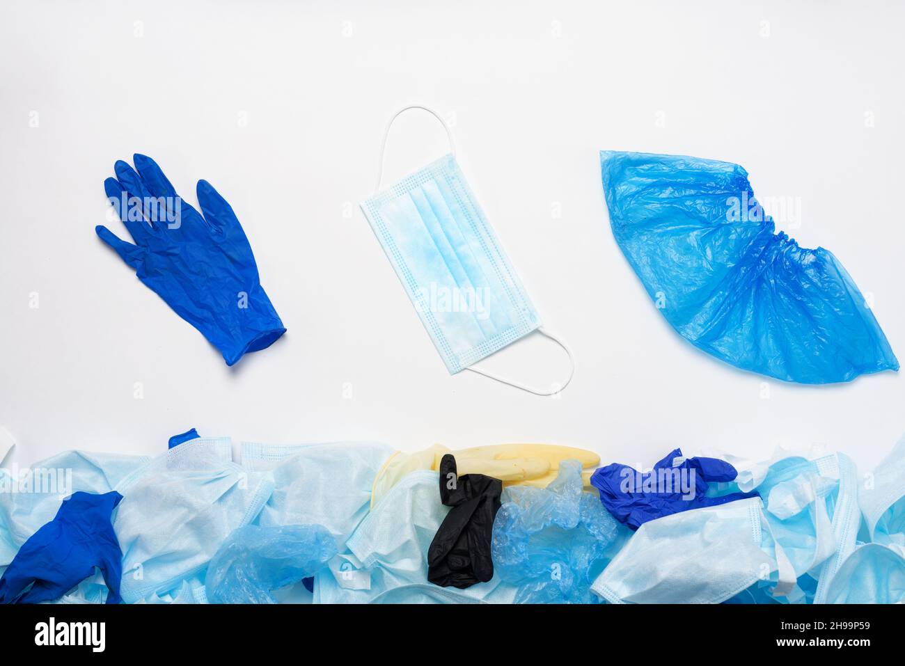 Waste of used personal protective equipment PPE, gloves, disposable ...