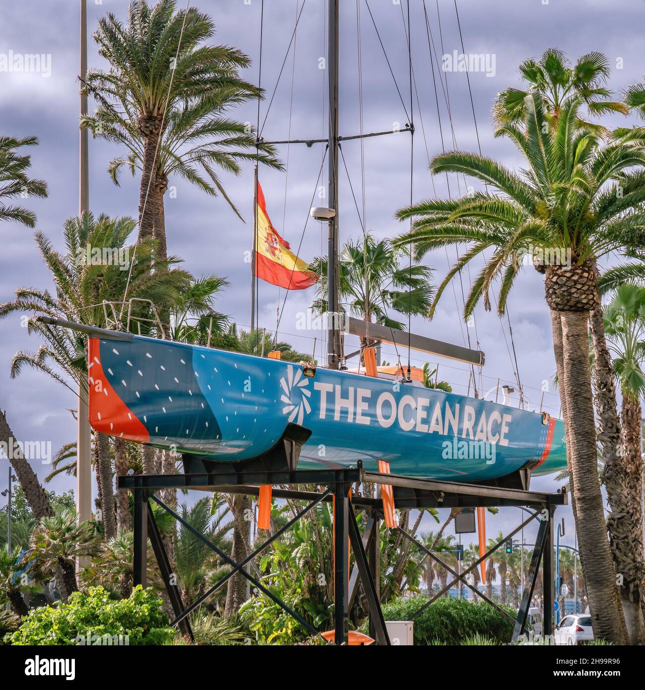 Ocean Race Sailboat monument on roundabout place with palms around ...
