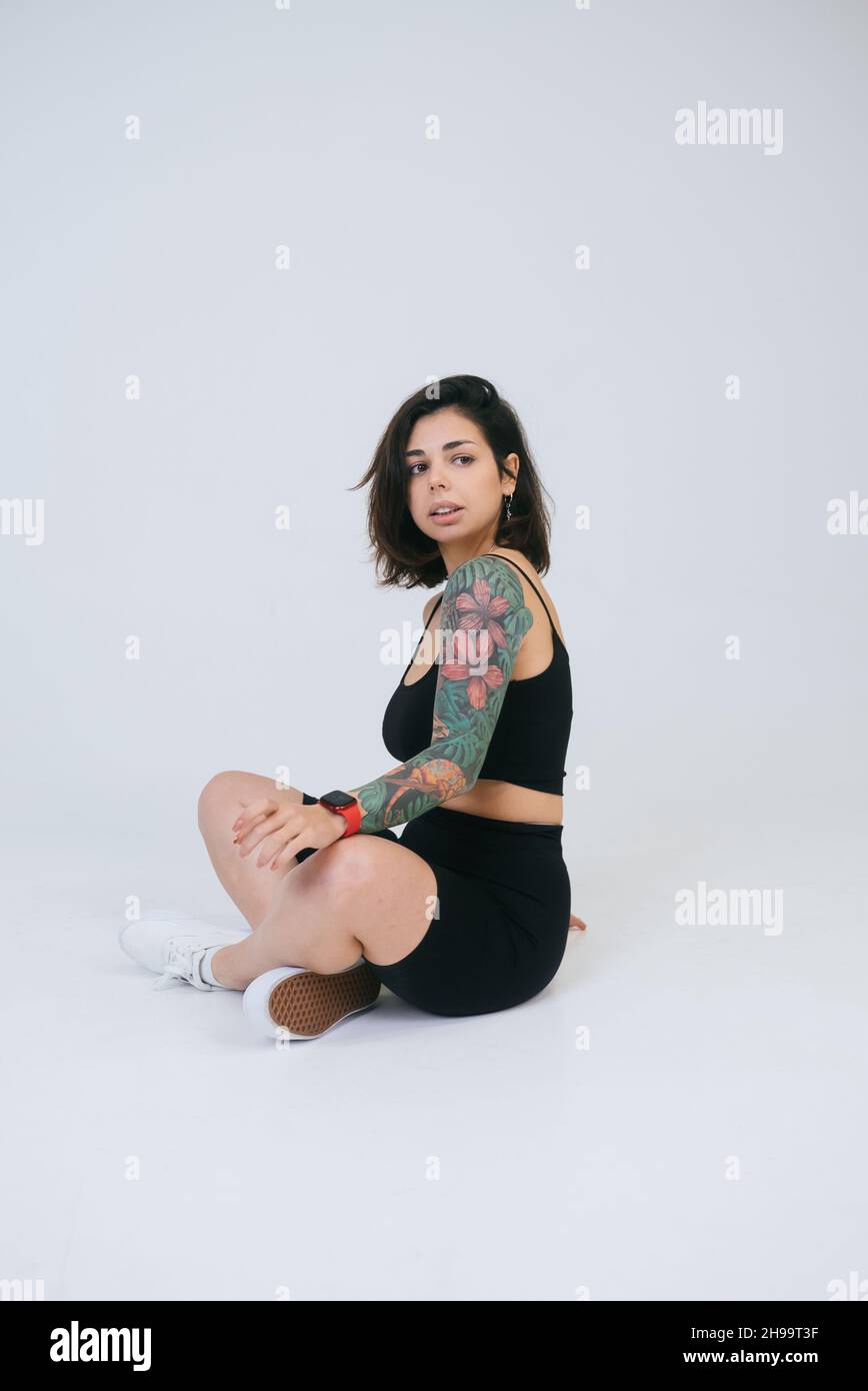 Beautiful Young Female Model in Isolated Studio Setting Stock Photo - Alamy