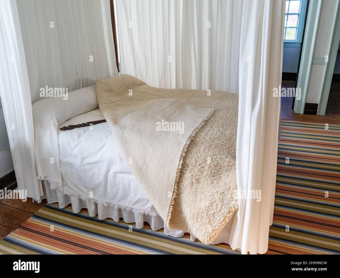 Old bed with the covers pulled back Stock Photo - Alamy