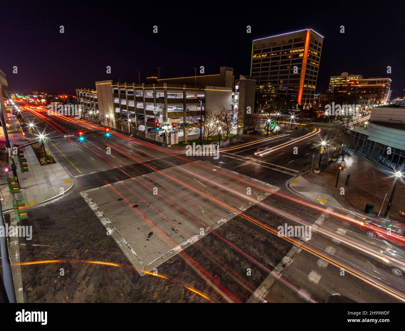 Car lights at night run through street intersection in Boise Idaho ...