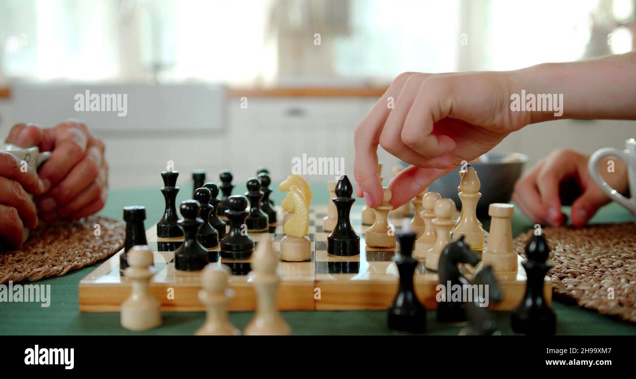 Hand holding chess piece hi-res stock photography and images - Alamy