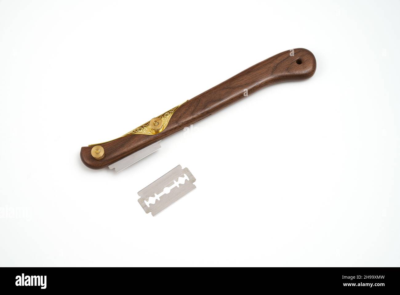 Bread making straight black walnut lame with an extra razor blade on a ...