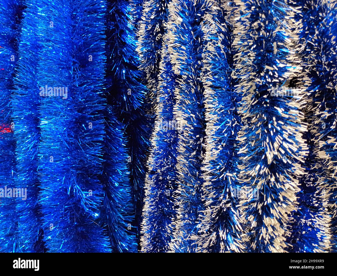 multi-colored tinsel on the Christmas tree Stock Photo - Alamy