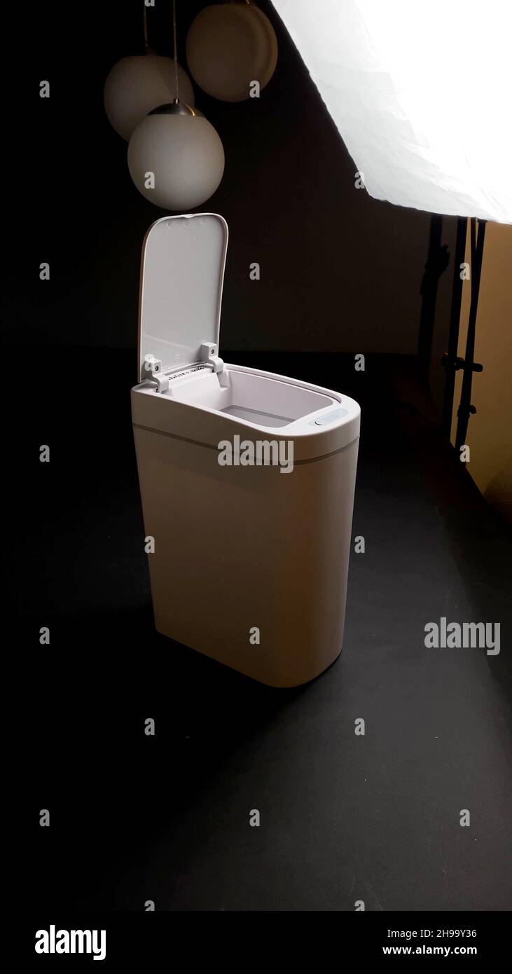 A vertical photo of a trash Stock Photo - Alamy