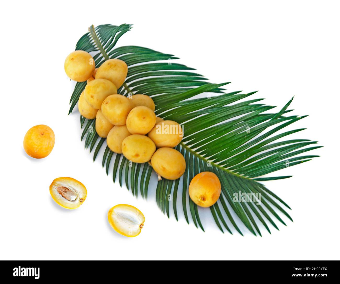 A bunch of fresh dates on palm leaf Stock Photo - Alamy