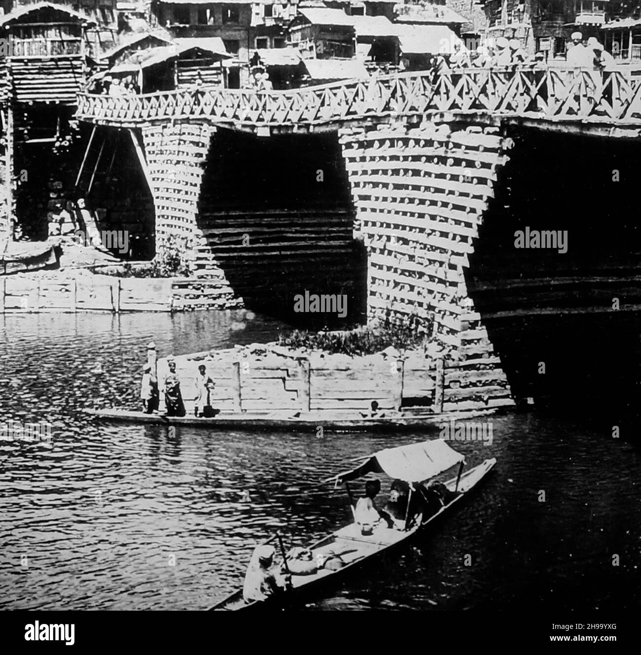 Old river bridge in Kashmir, early 1900s Stock Photo - Alamy