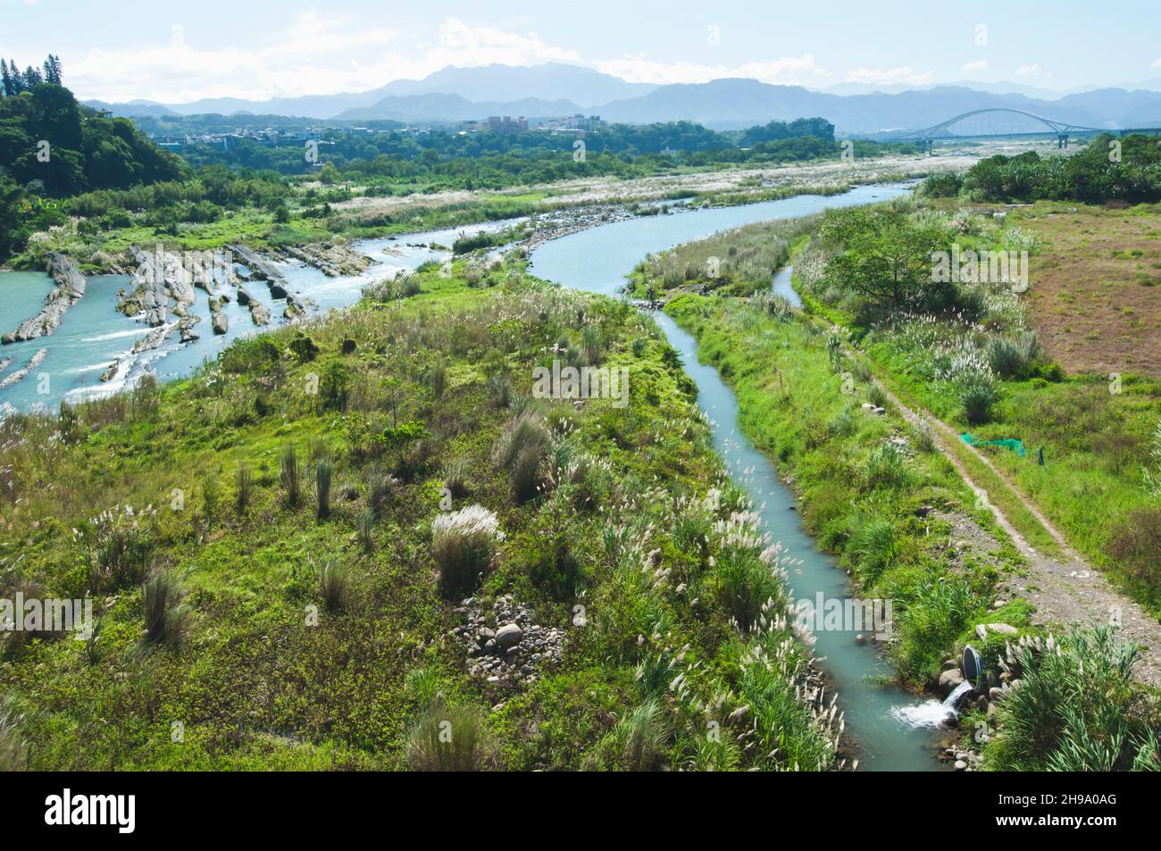 Irrigation channels and a drainage overflow ditch cut into the ...