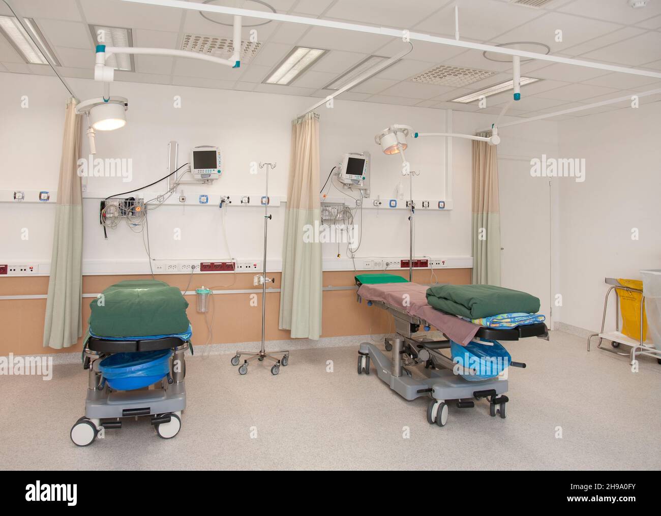 Patient faciities in a modern hospital, beds and patient bays ...