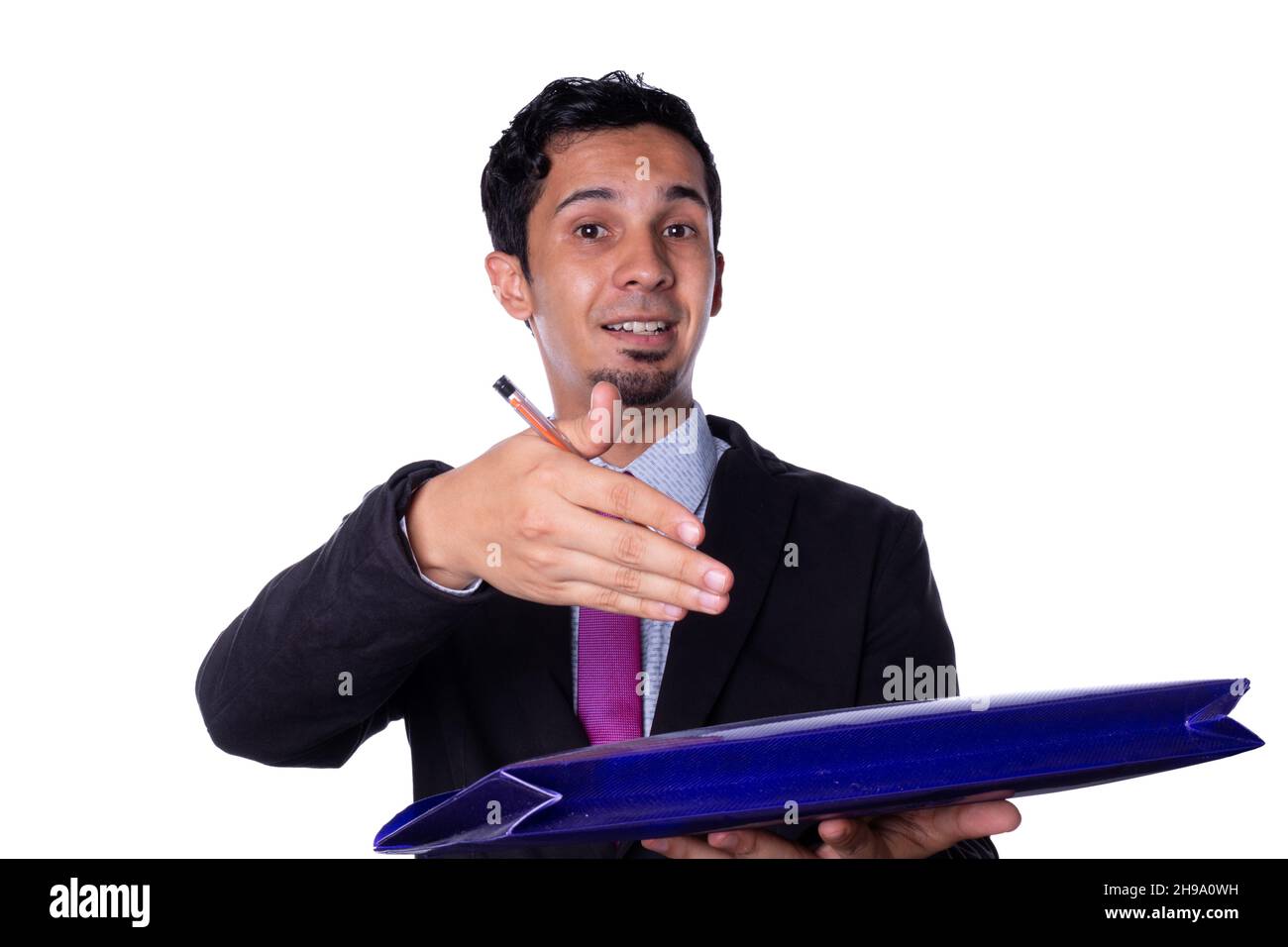 Young worker showing a folder to camera while smiling, isolated on ...