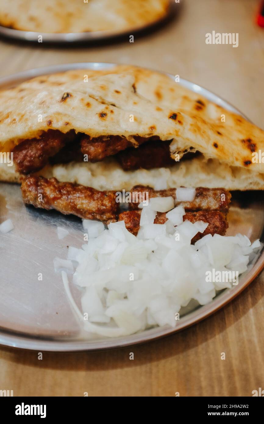 A vertical shot of Balkans traditional food cevapi Stock Photo - Alamy