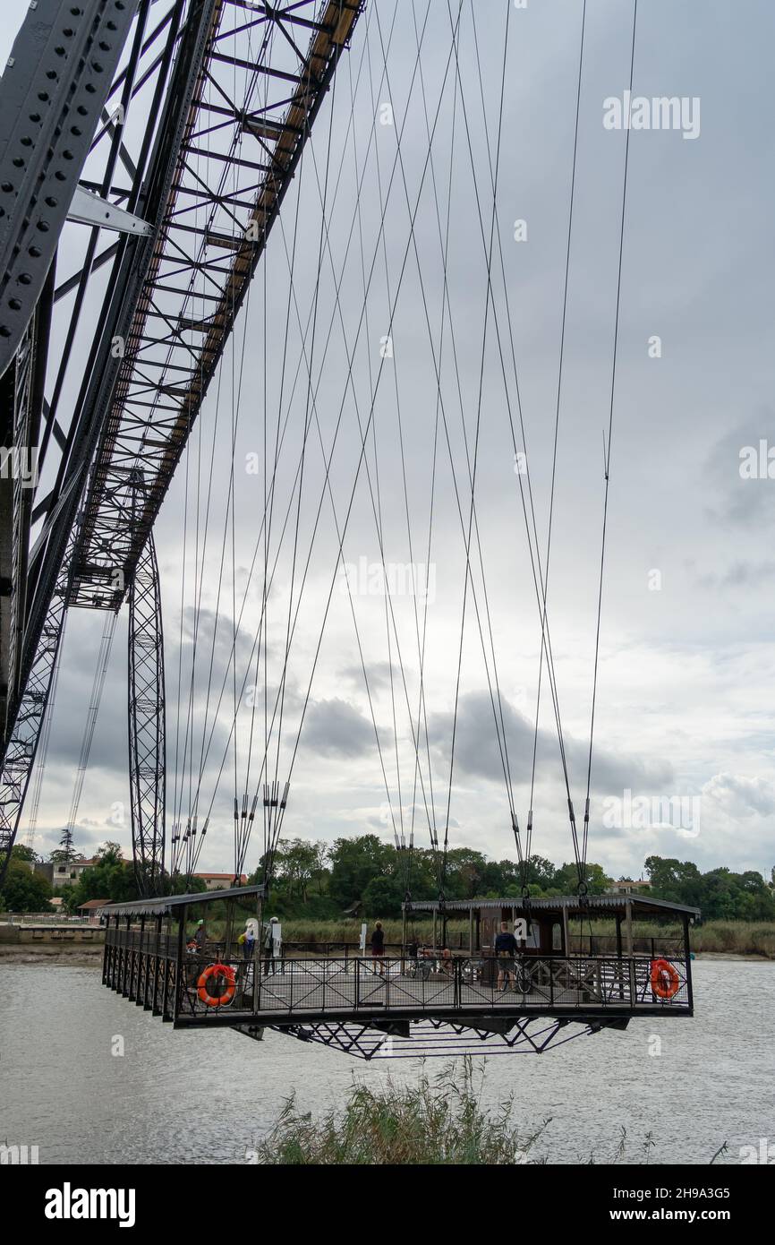 Transporter Bridge over the Charente river under a cloudy sky. National ...