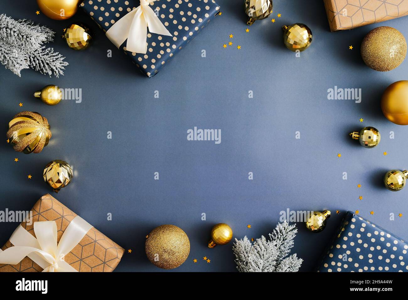 Christmas frame. Christmas blue background with gift boxes, golden ...
