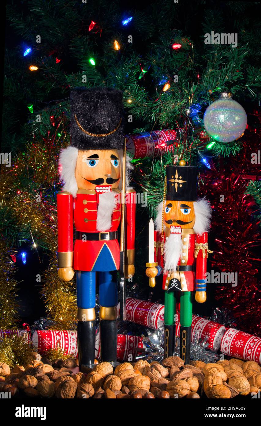 Christmas Nutcrackers with Nuts Tinsel and Christmas Tree Stock Photo ...