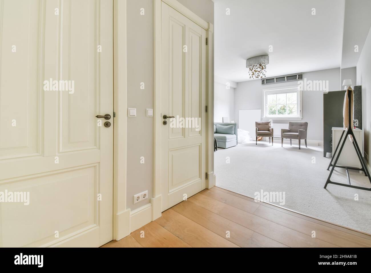 A short corridor leading to the living room Stock Photo - Alamy