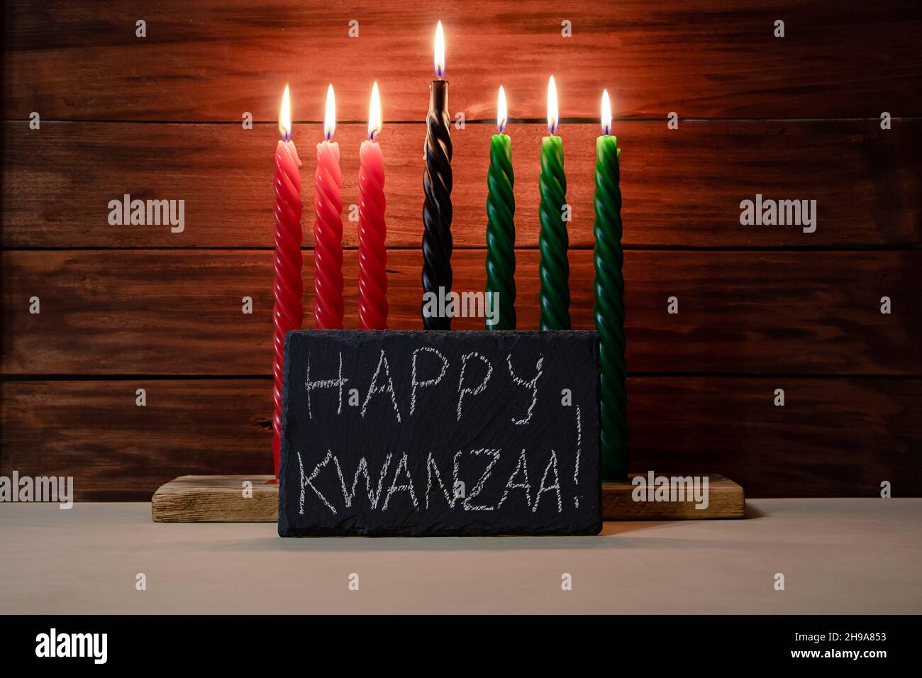 Happy Kwanzaa. African American holiday. Seven candles red, black and ...