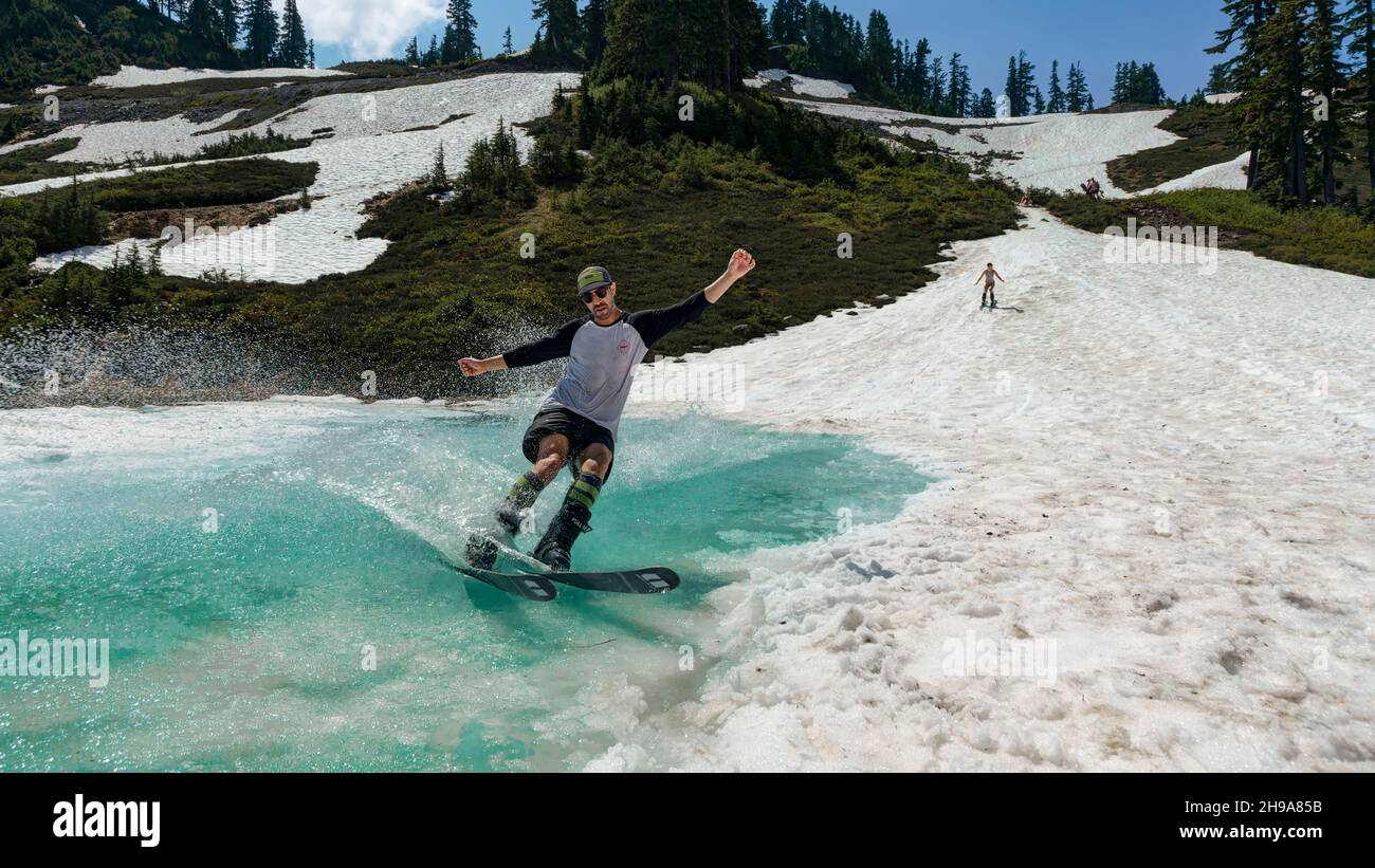 Skier on Melted Snow. Heather Meadows, North Cascades National Park ...