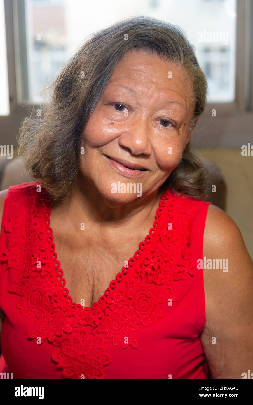 Portrait of a woman's face against light greenish background. Salvador ...