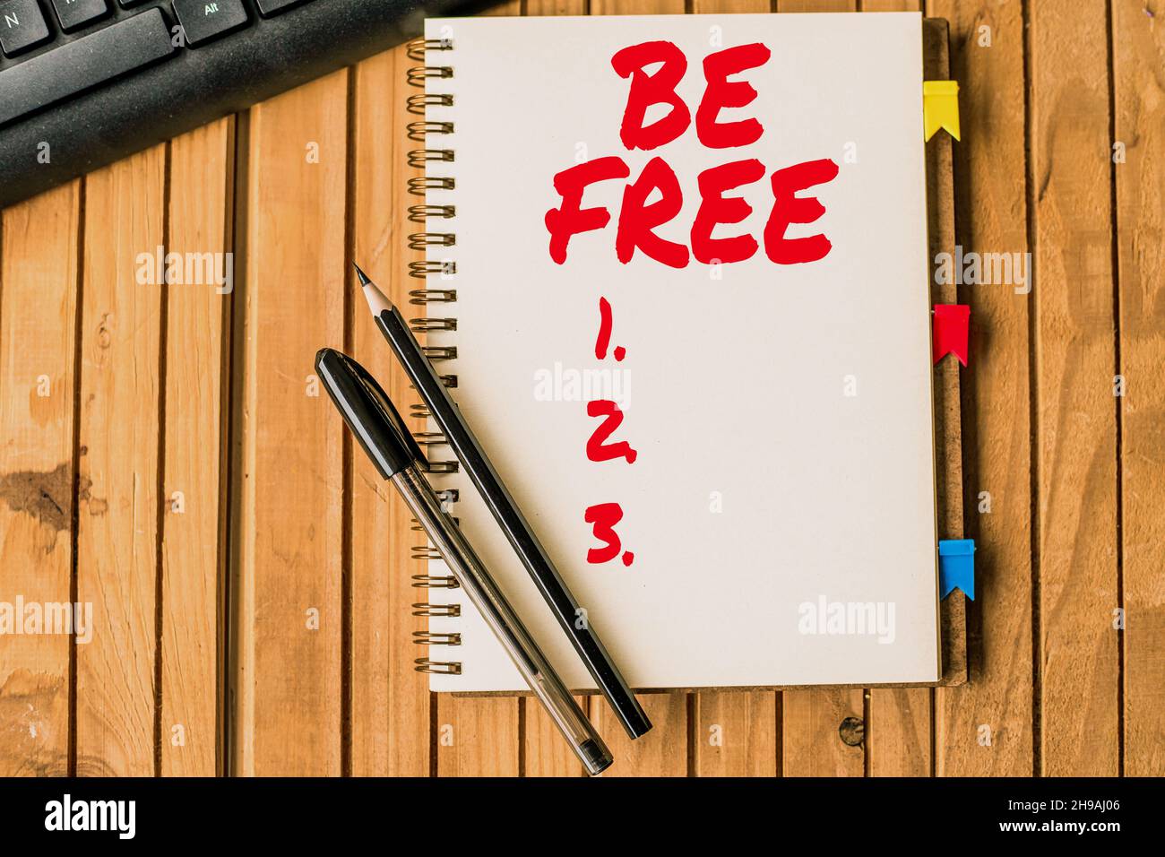 Sign displaying Be Free. Word Written on ability to do whatever you ...