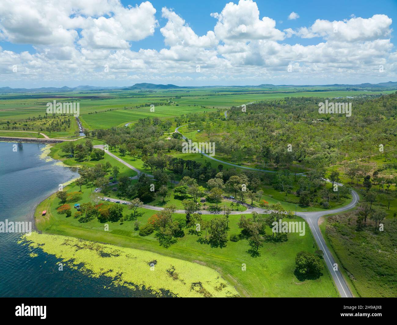 Top down view onto Kinchant Dam recreational area with dam wall and ...