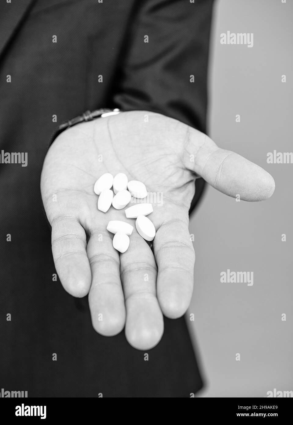Take pill male hi-res stock photography and images - Alamy