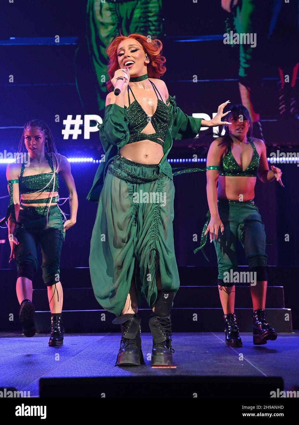 SAN JOSE, CALIFORNIA - DECEMBER 04: Doja Cat performs during the 2021 ...