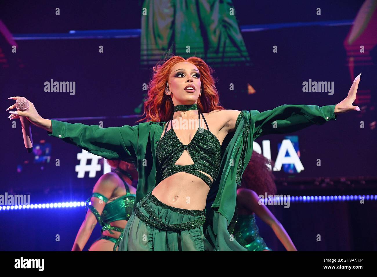 SAN JOSE, CALIFORNIA - DECEMBER 04: Doja Cat performs during the 2021 ...